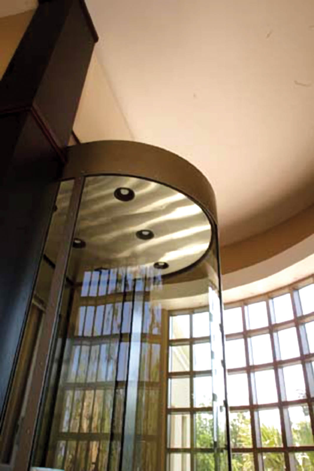 Curtains conceal elevator mechanics - Specialty Fabrics Review